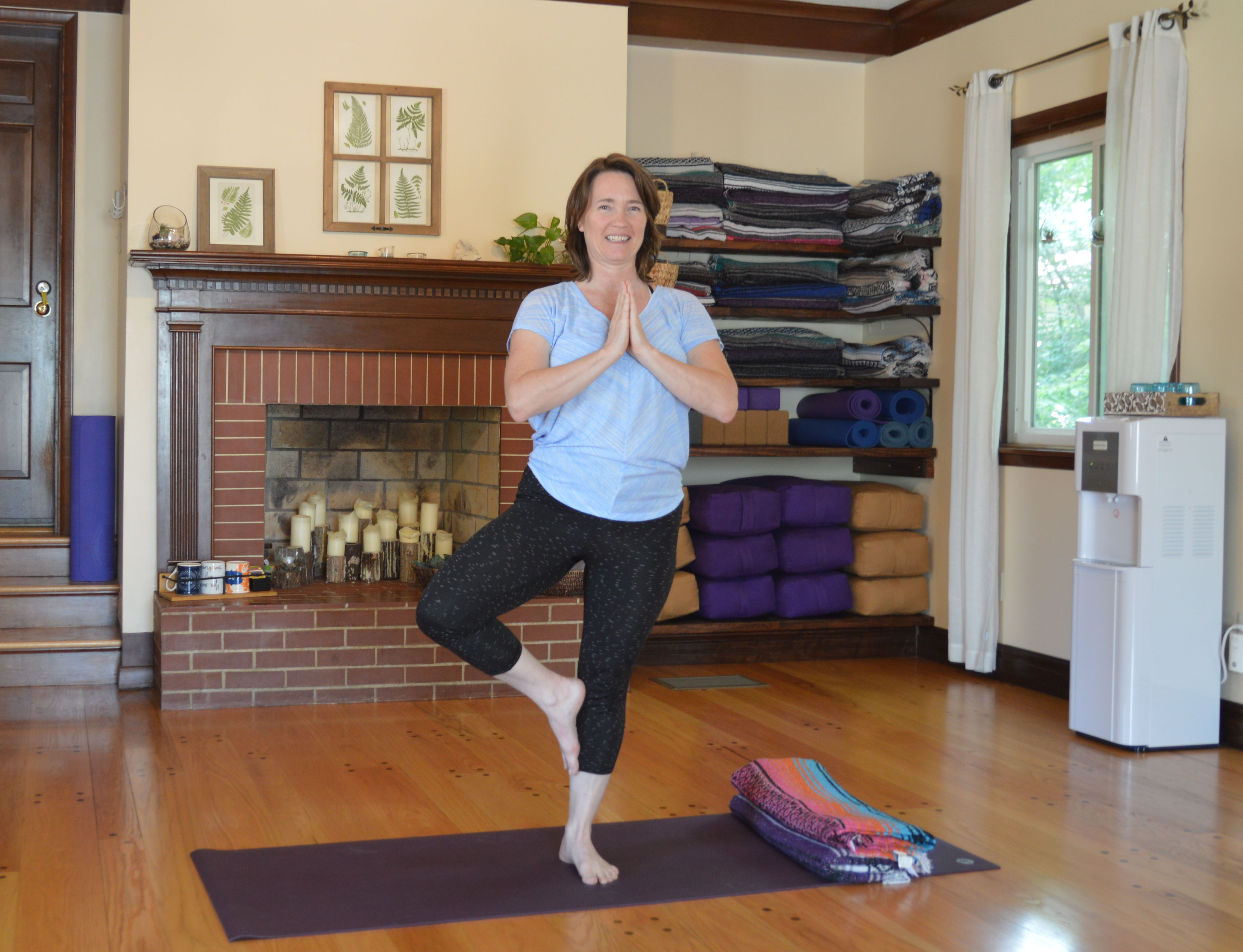 Local yoga instructor finds starting point for balance right under her ...